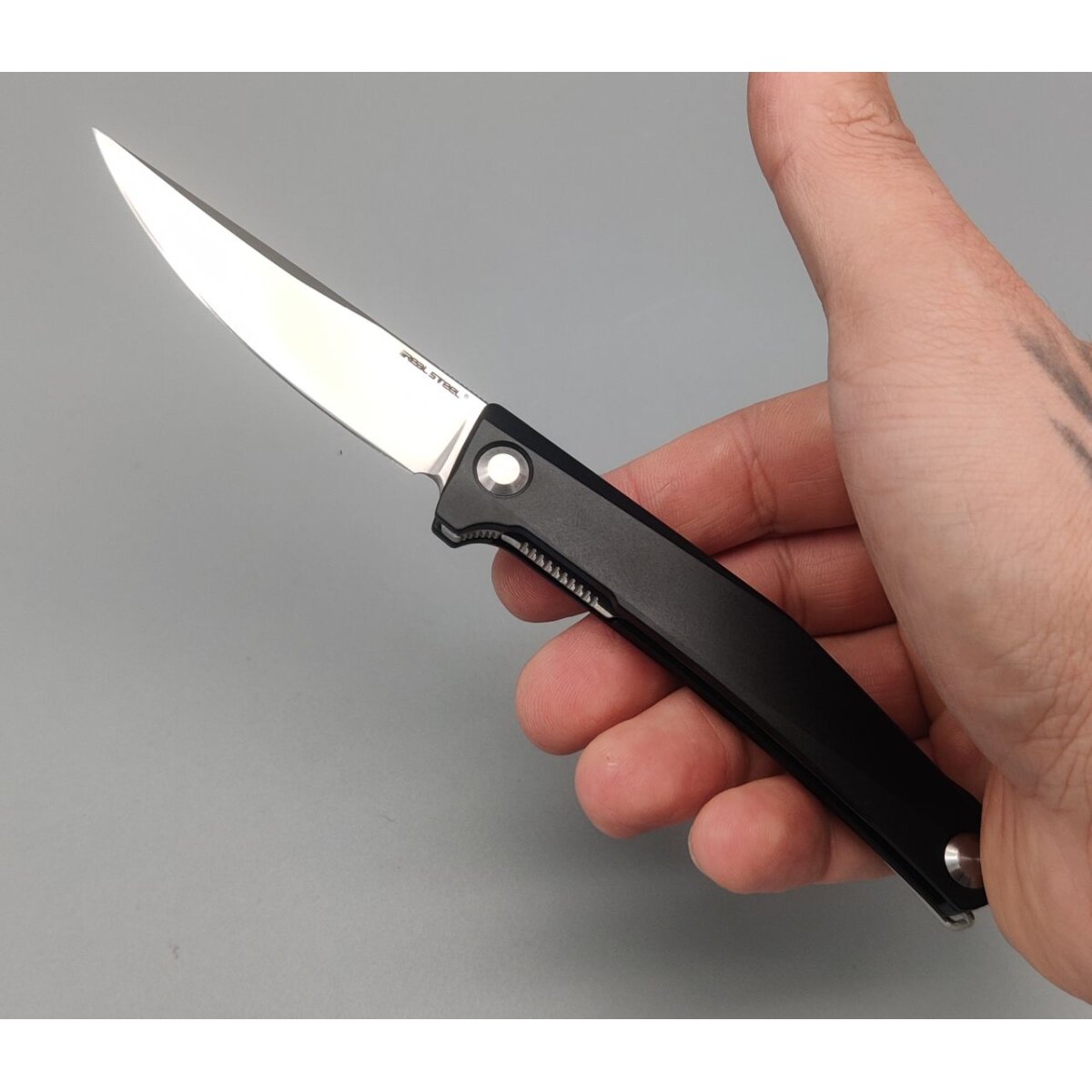 Real Steel Teres Black Satin Flipper, 75,95
